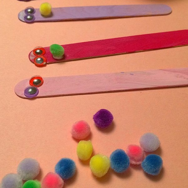 Super Fun Craft Stick Love Bugs!